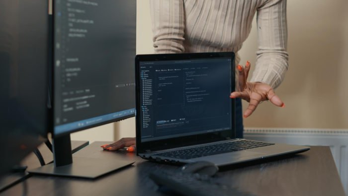 Closeup Laptop Running Algorithm Parsing Code Desk Front Programmers Doing Team Work Group